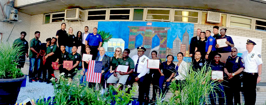 Students and police join forces for 90th Precinct mural – The Greenline